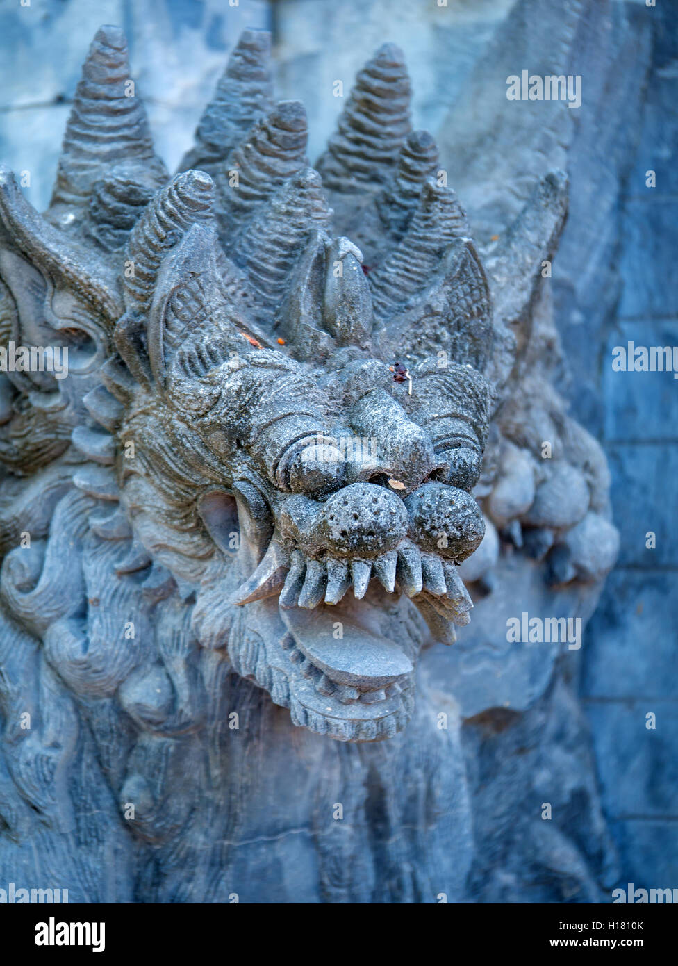 Stone sculpture on entrance door of Pura Padmasana Puja Mandala temple ...