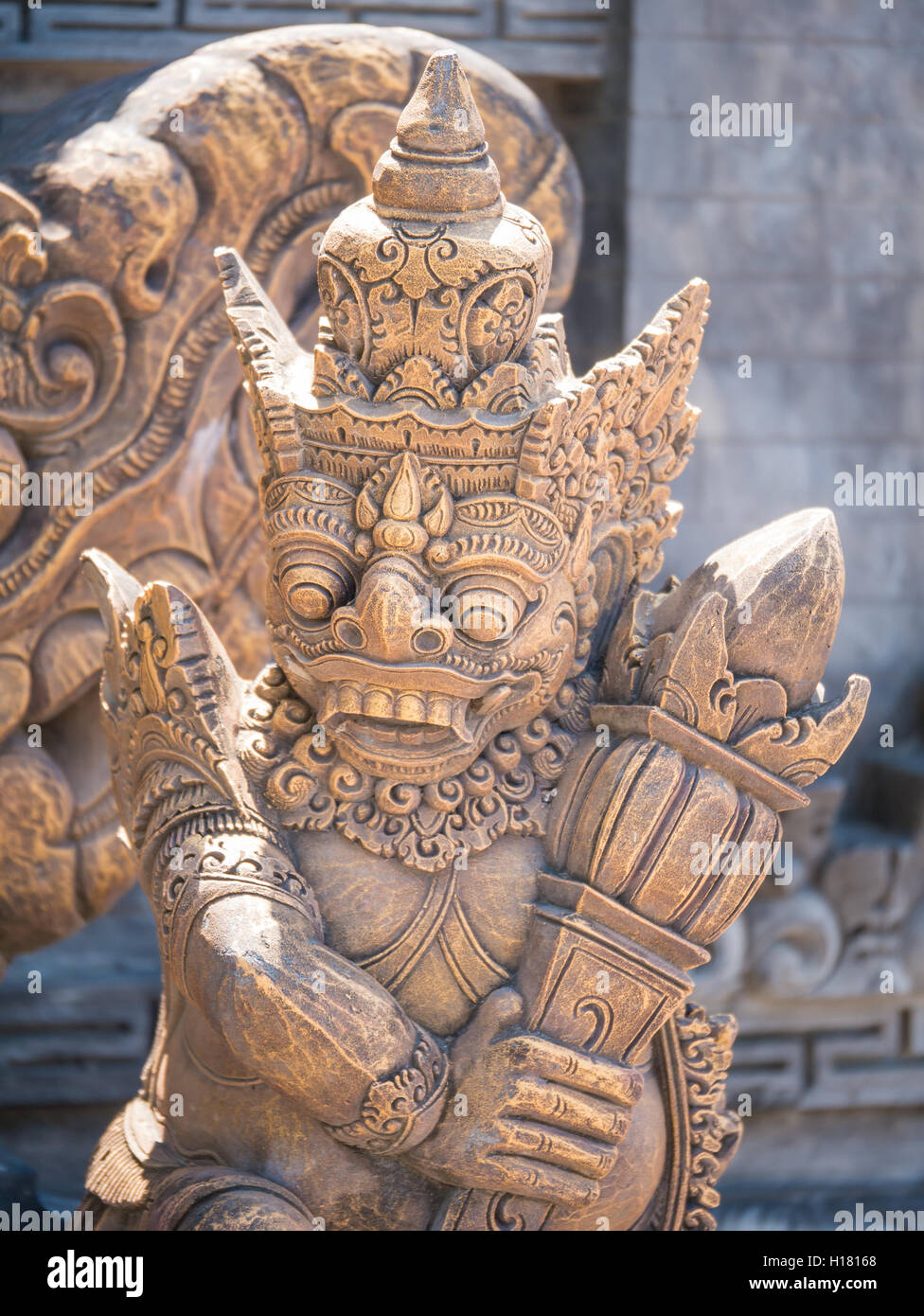 Stone sculpture on entrance door of Pura Padmasana Puja Mandala temple ...