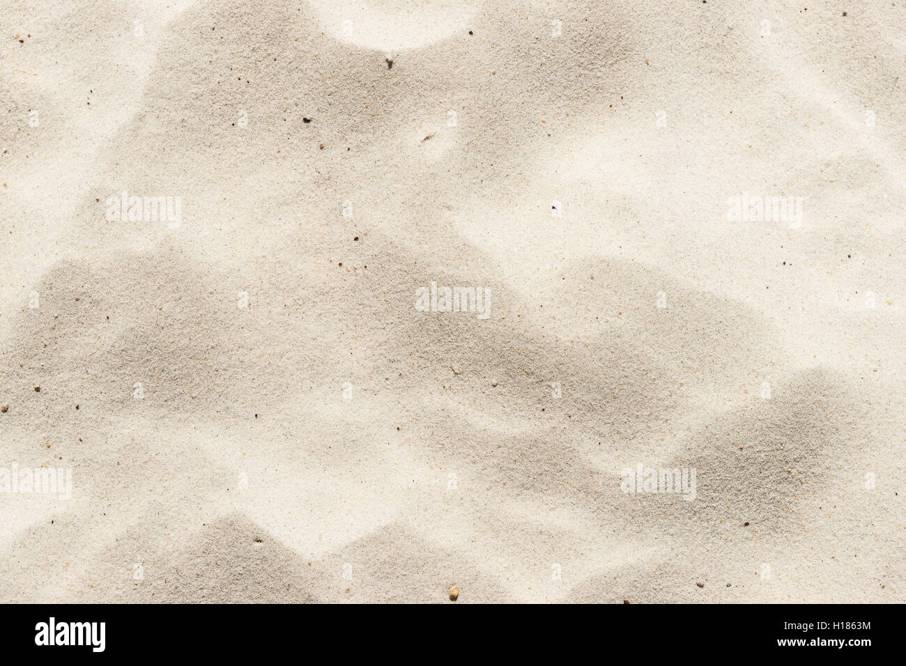 Sand pattern with play of light and shadow. Can be used as a texture or ...