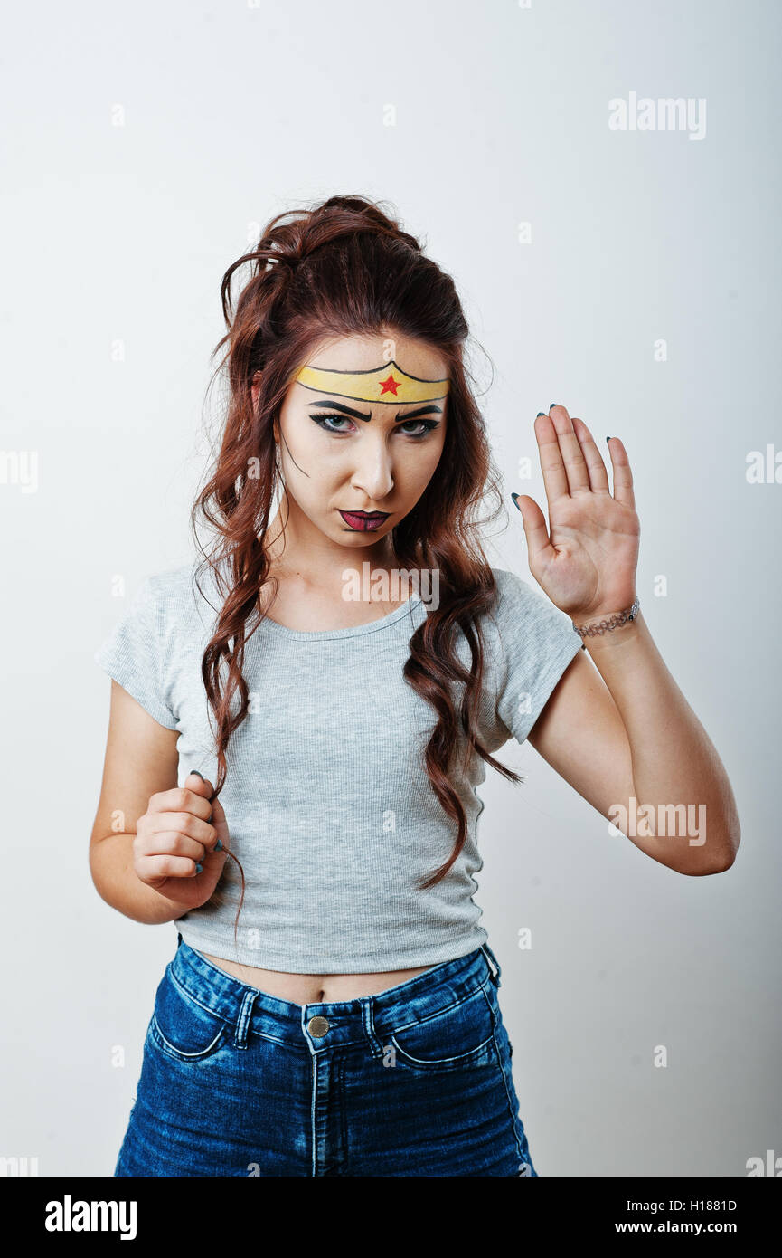 Studio portrait of girl with asian appearance and bright make up with ...