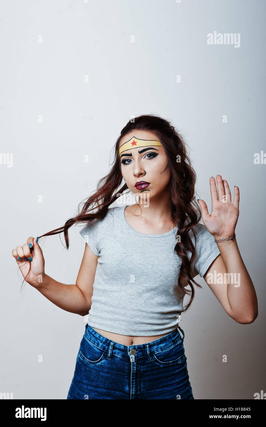 Studio portrait of girl with asian appearance and bright make up with ...