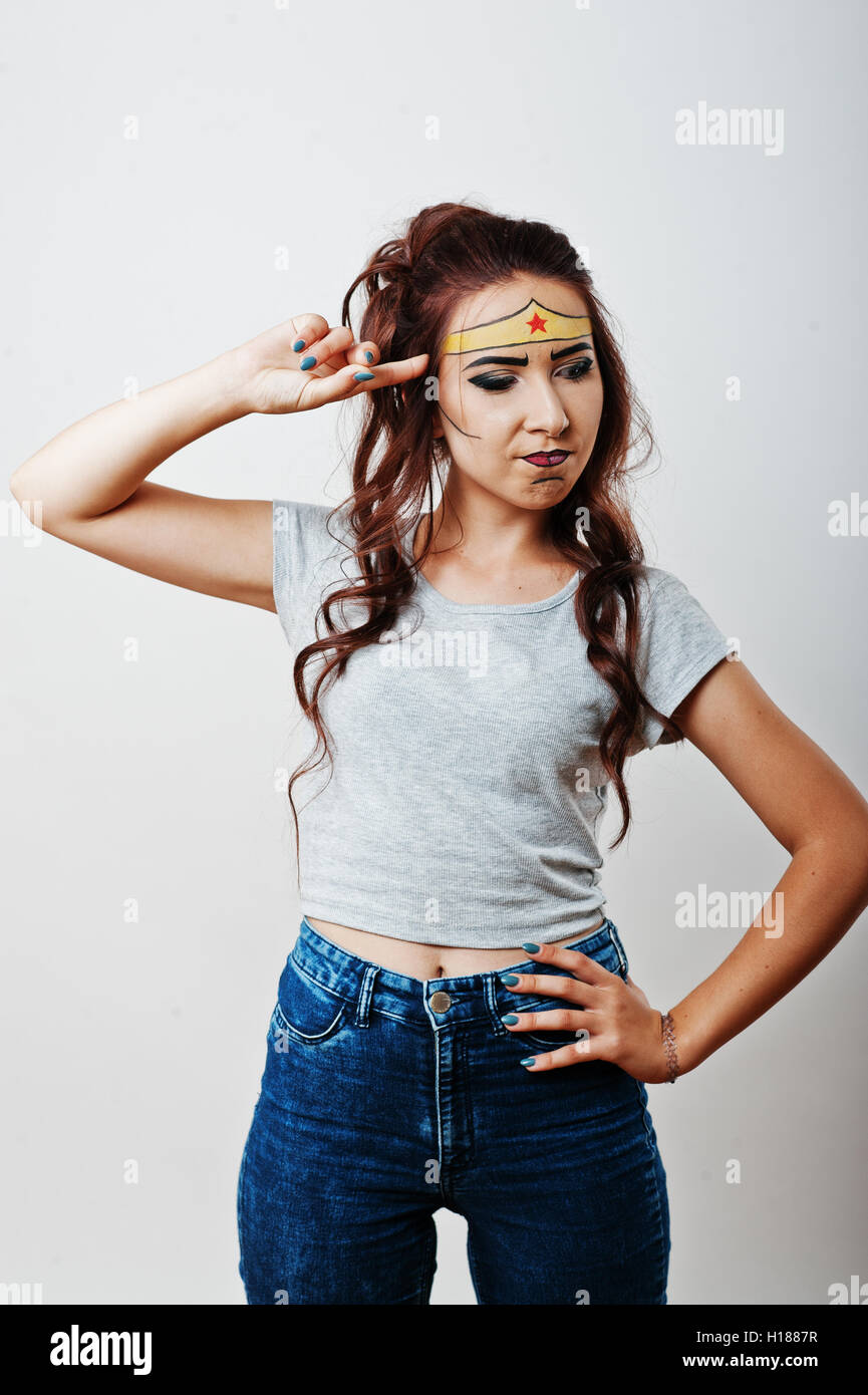 Studio portrait of girl with asian appearance and bright make up with ...