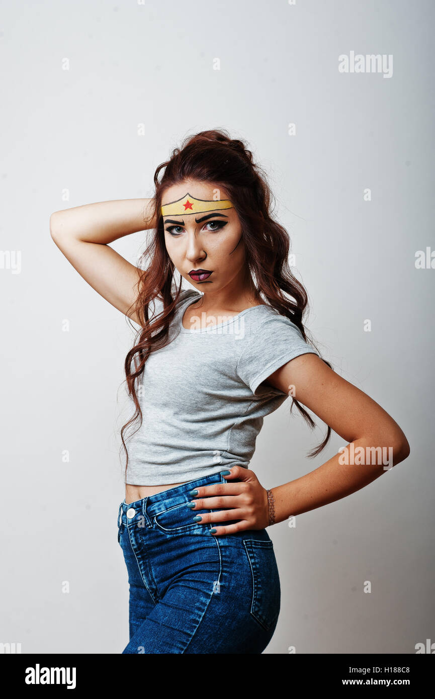 Studio portrait of girl with asian appearance and bright make up with ...