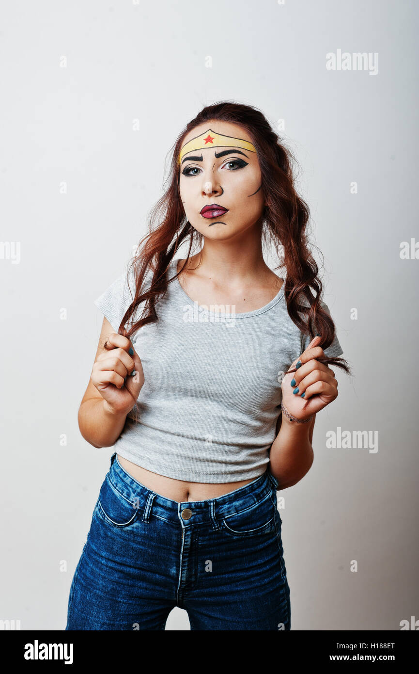 Studio portrait of girl with asian appearance and bright make up with ...