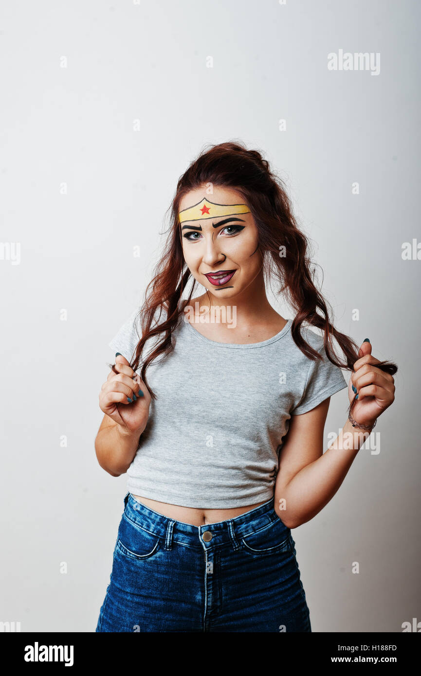Studio portrait of girl with asian appearance and bright make up with ...