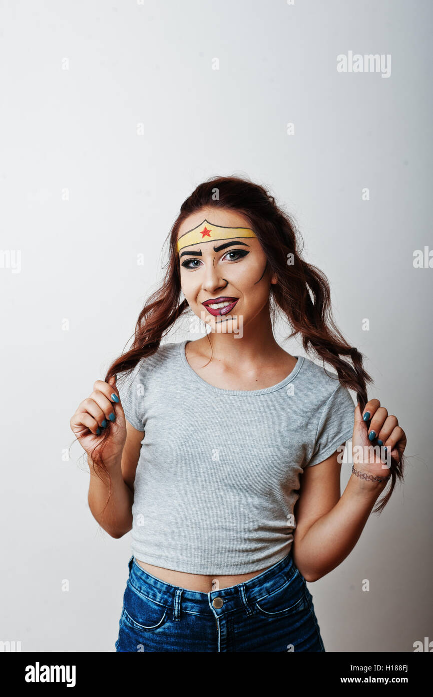Studio portrait of girl with asian appearance and bright make up with ...