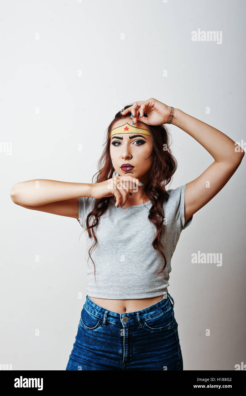 Studio portrait of girl with asian appearance and bright make up with ...