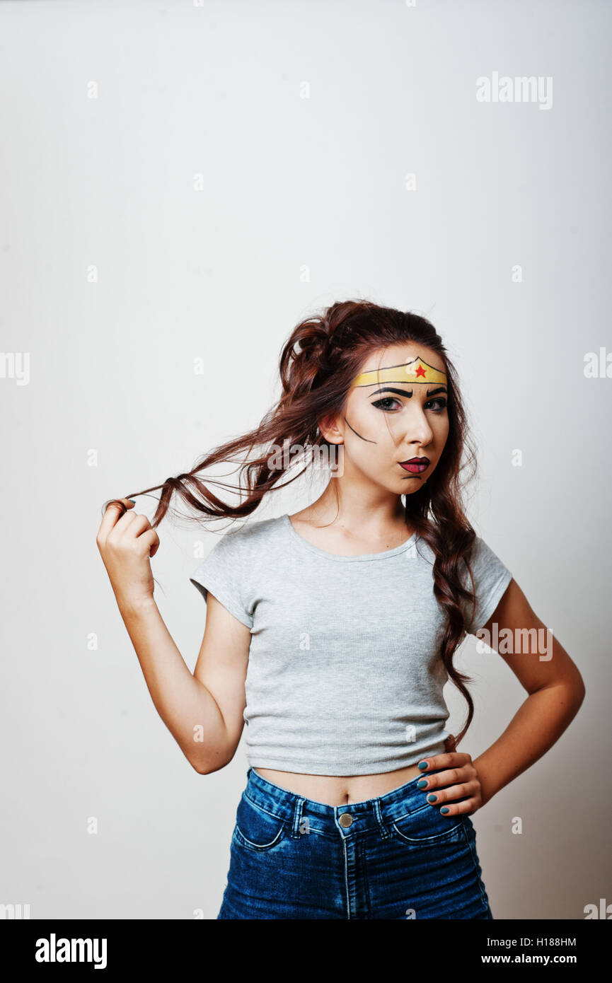 Studio portrait of girl with asian appearance and bright make up with ...