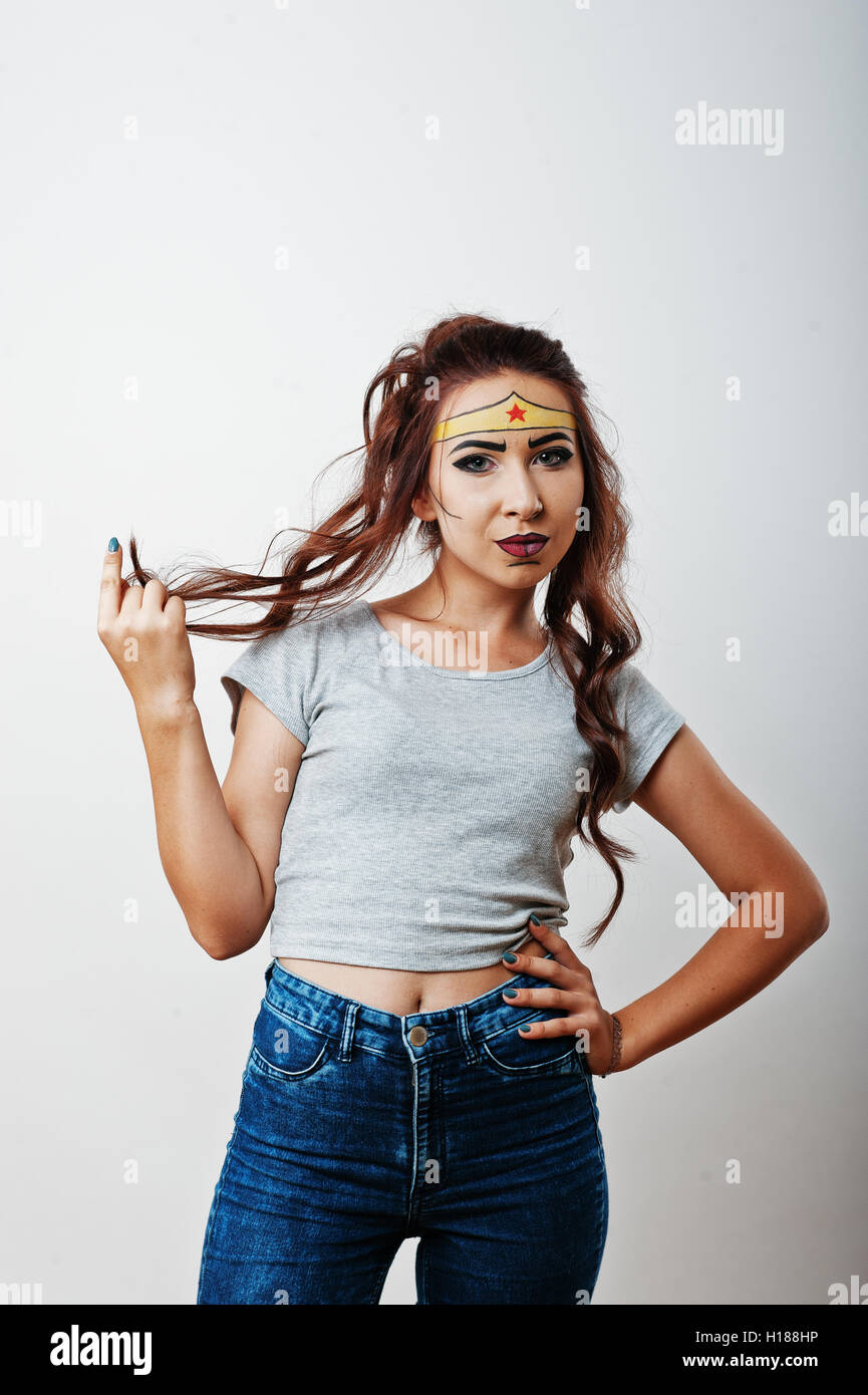 Studio portrait of girl with asian appearance and bright make up with ...