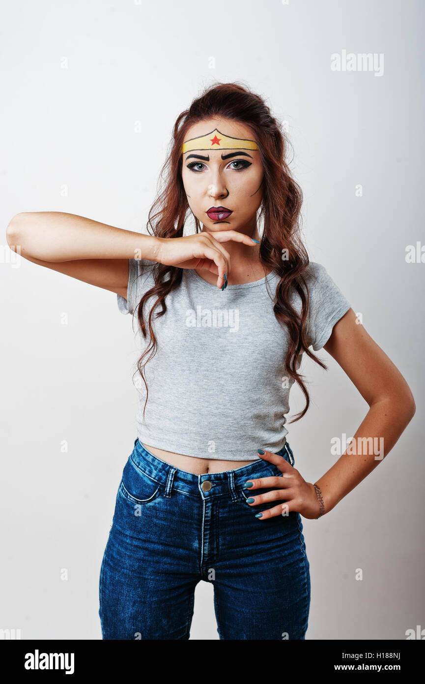 Studio portrait of girl with asian appearance and bright make up with ...