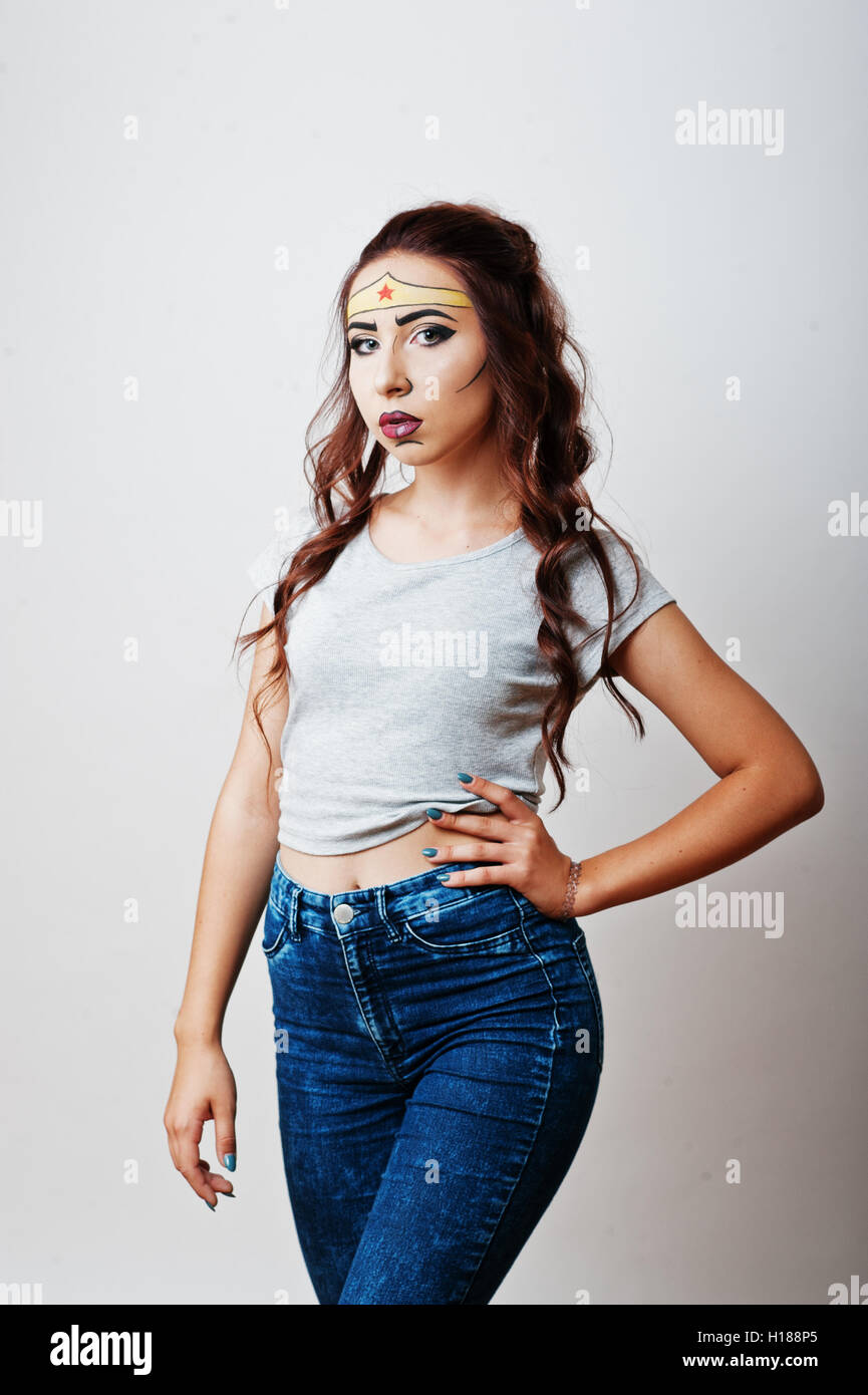 Studio portrait of girl with asian appearance and bright make up with ...