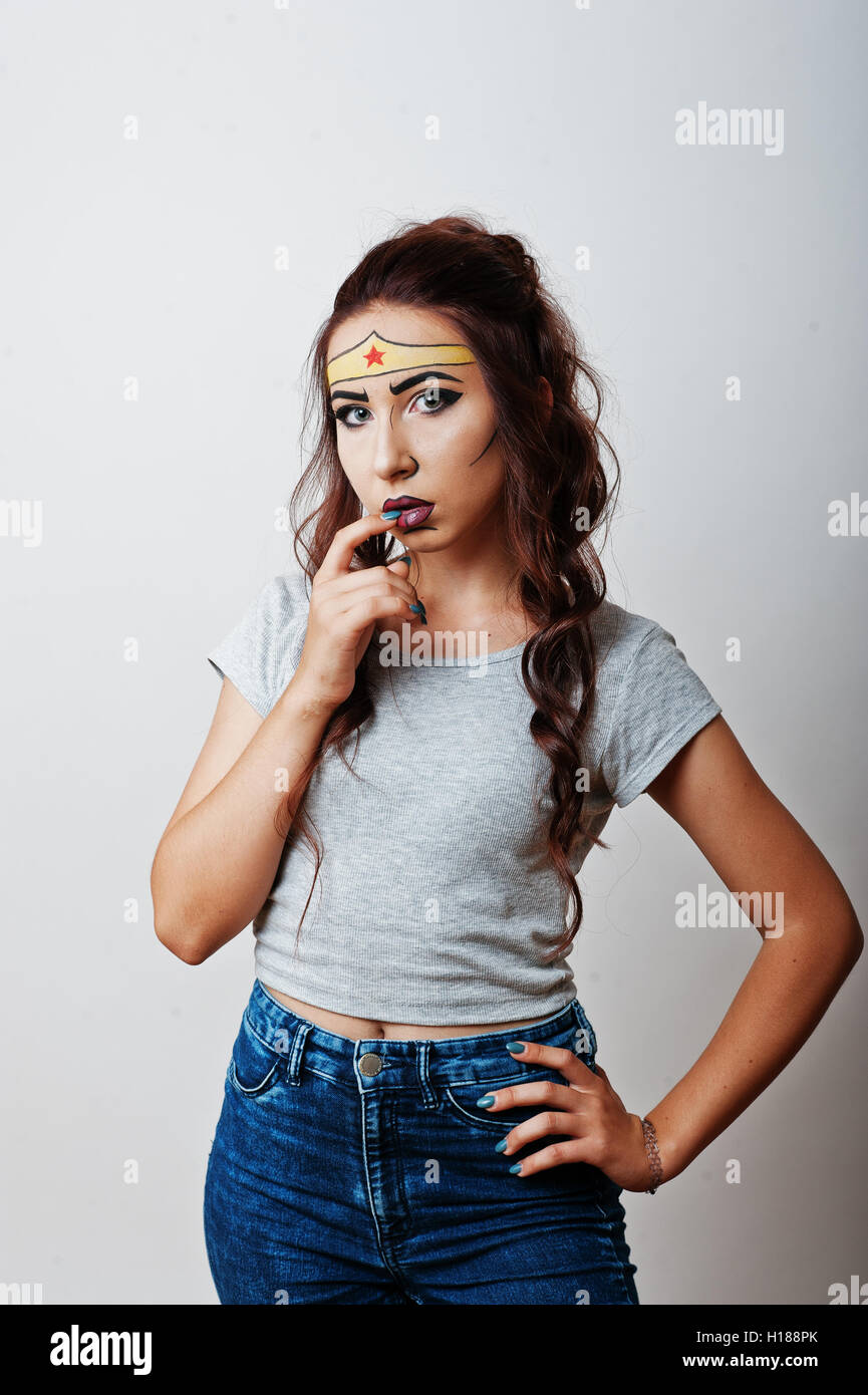 Studio portrait of girl with asian appearance and bright make up with ...