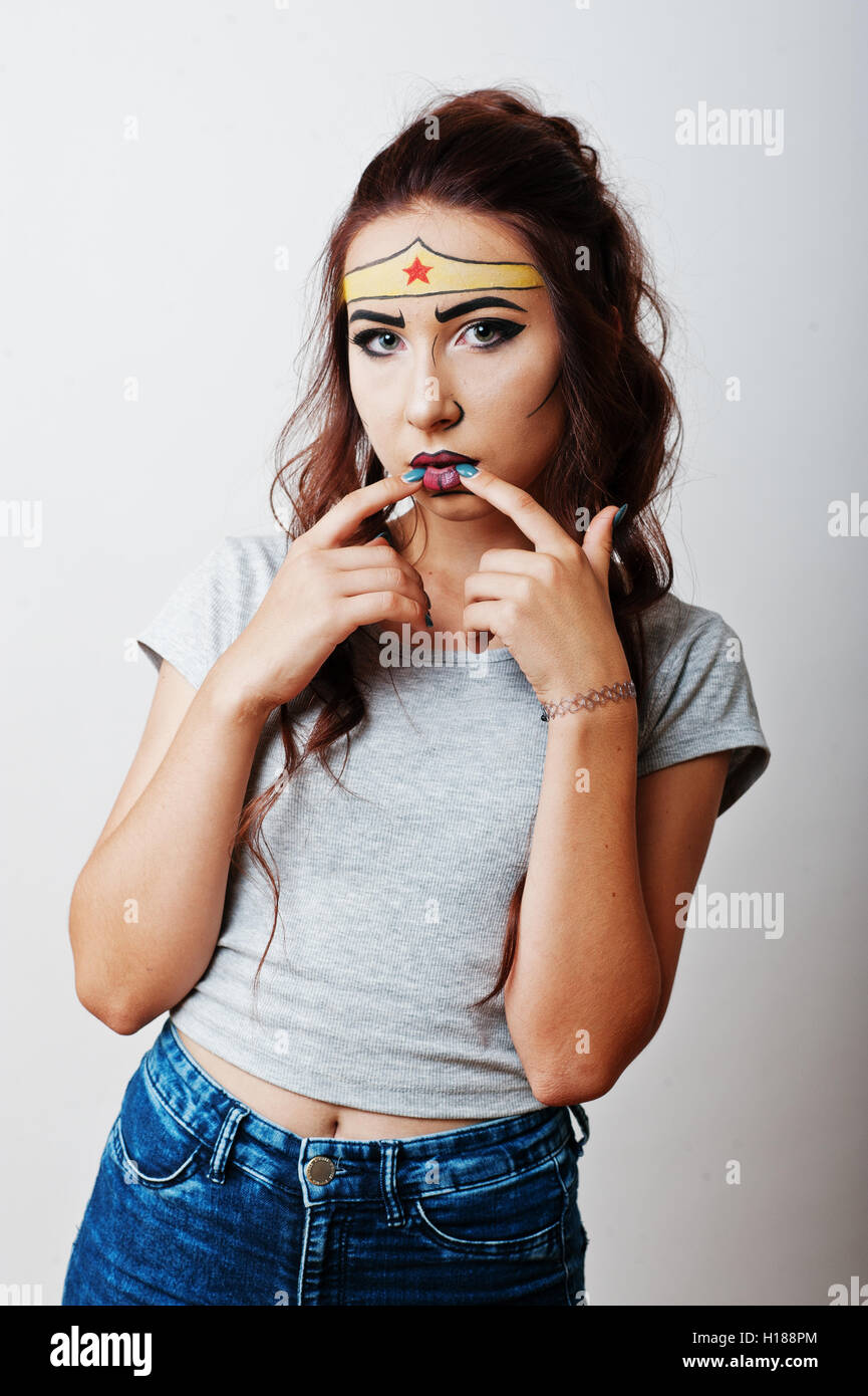 Studio portrait of girl with asian appearance and bright make up with ...