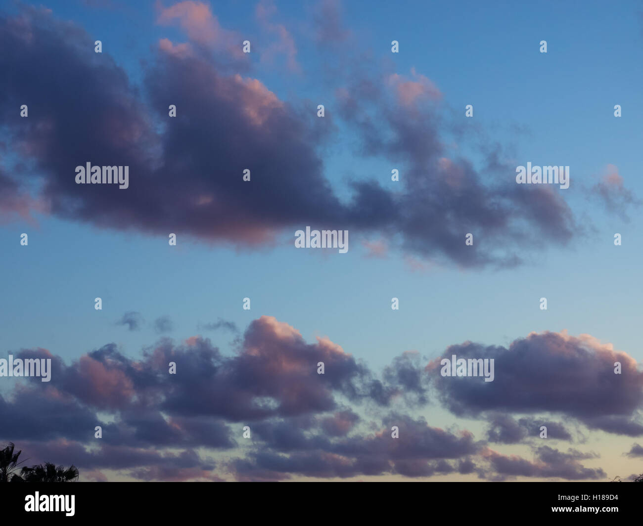 Horizontal picture of clouds in the sky during sunset Stock Photo - Alamy