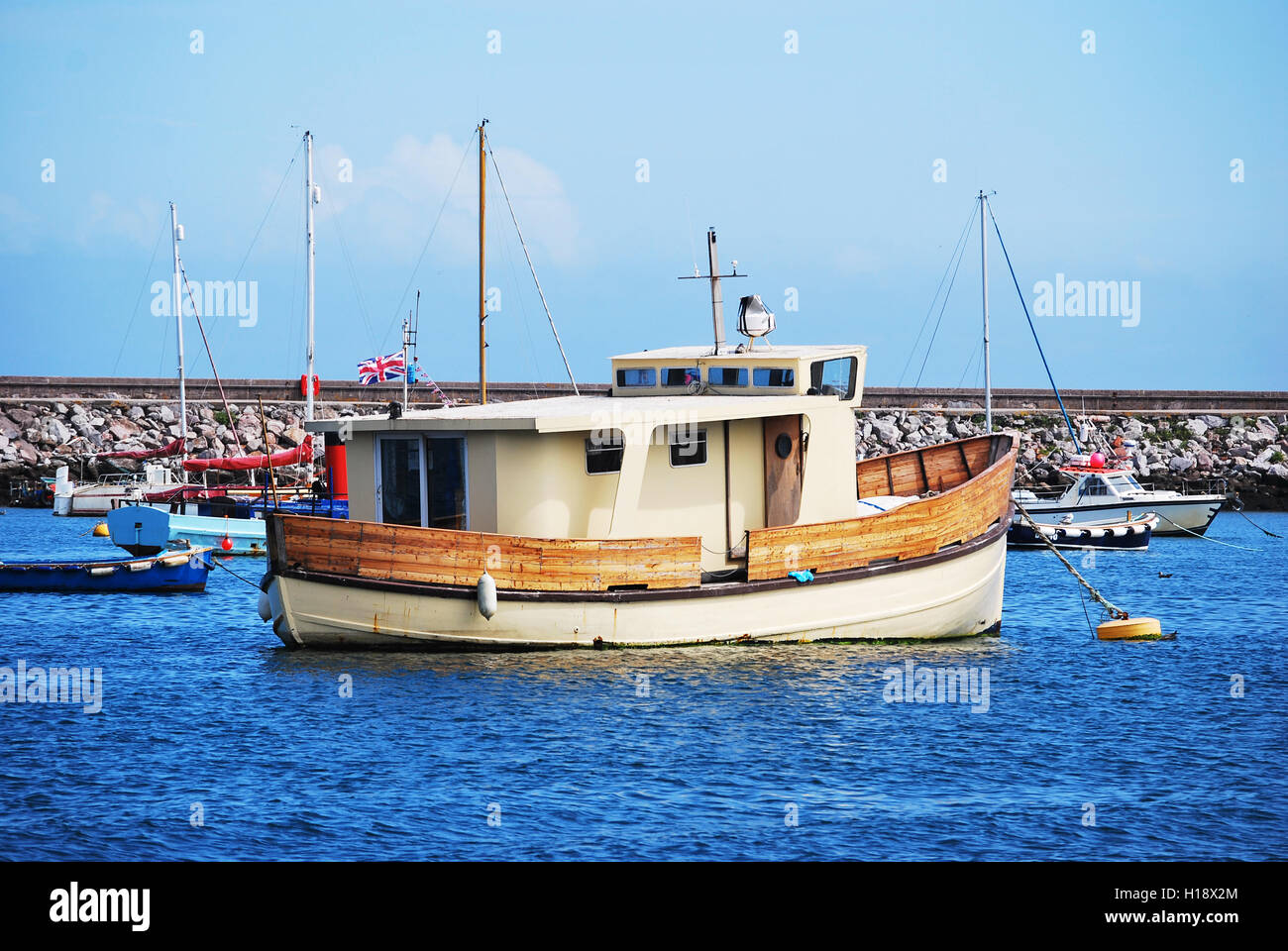 brown boat photographed in Brixham, Devon, UK Stock Photo - Alamy