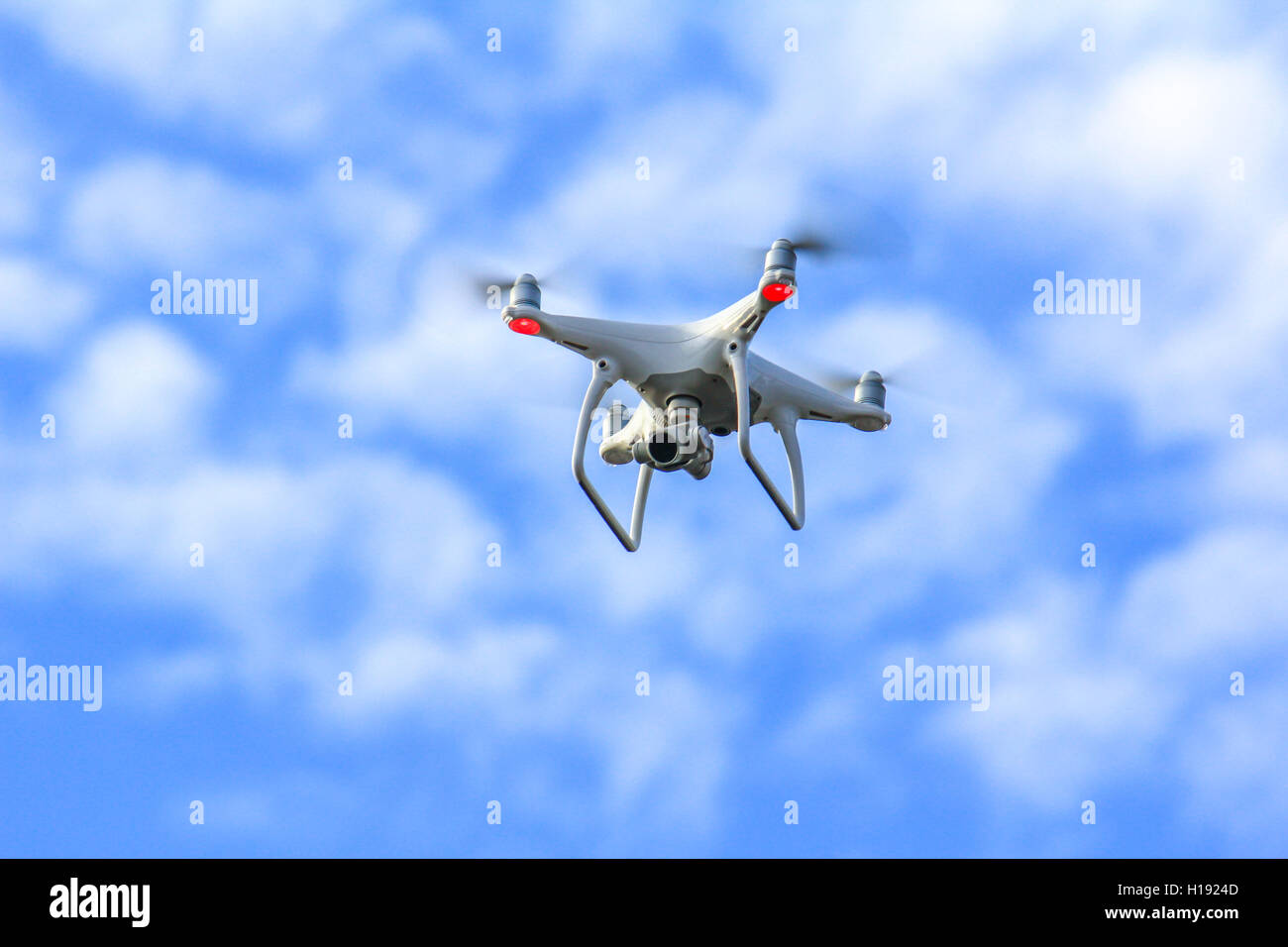 White Drone fly, take off to the air Stock Photo - Alamy