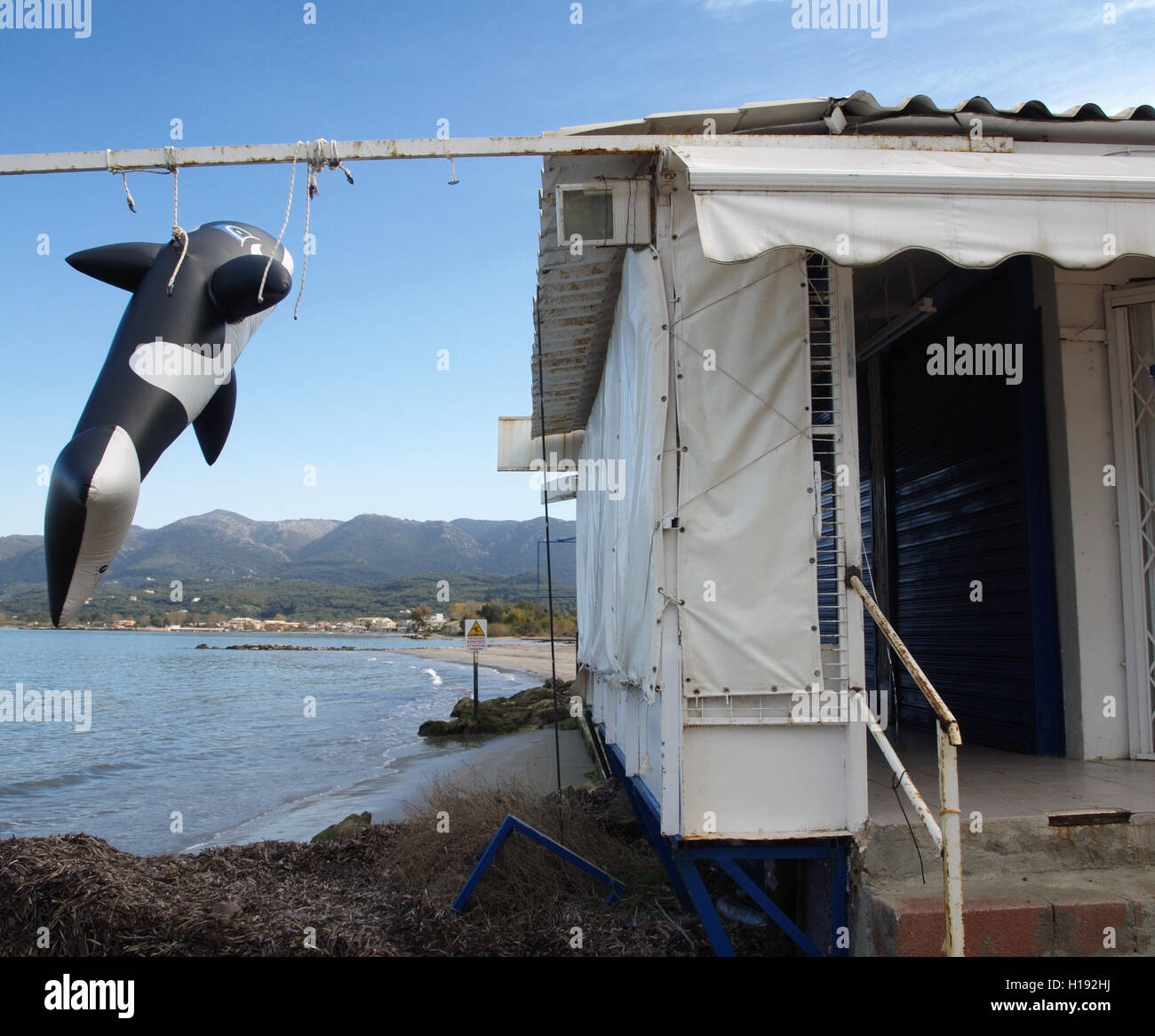 Abandoned inflatable killer whale and shop, closed for winter at Roda ...