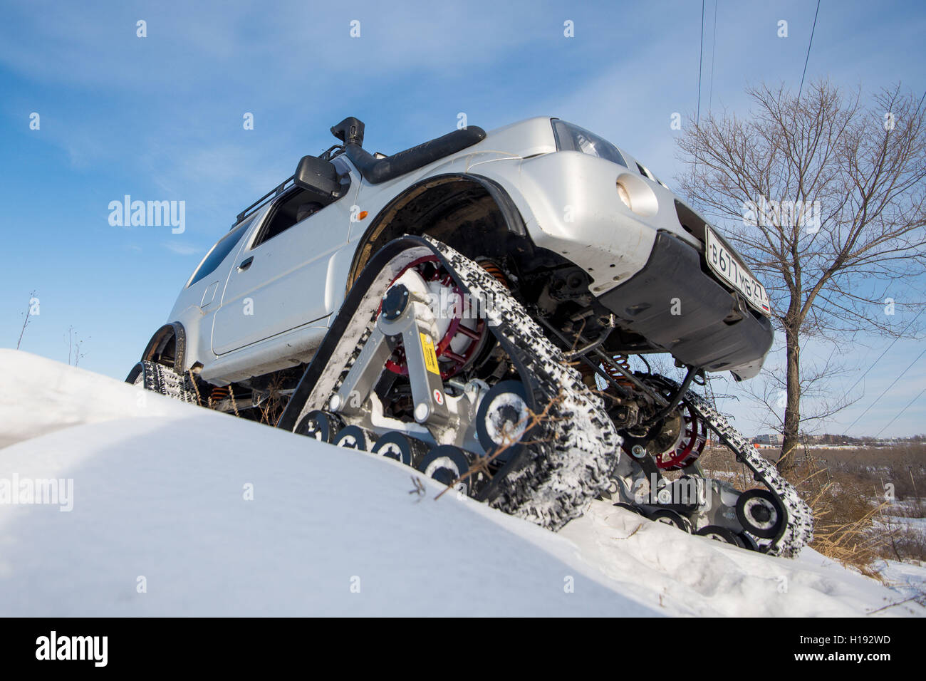 the car rides on tracks in the winter Stock Photo - Alamy
