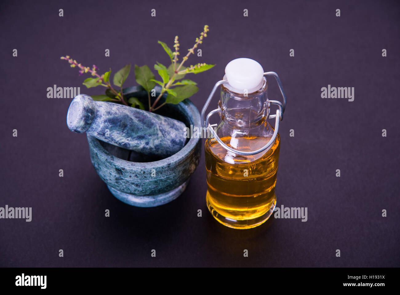 Tulsi oil or holy basil oil with Mortar and Pestle, tulsi or holy basil ...