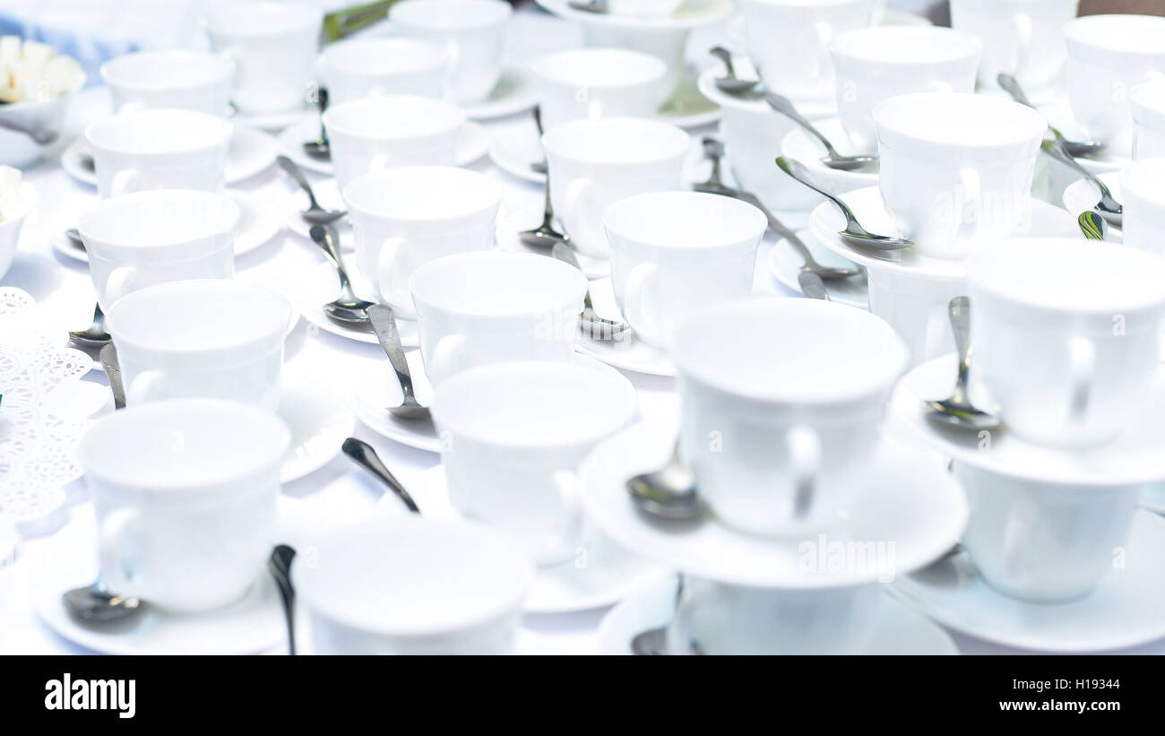Table full of tea or coffee cups Stock Photo - Alamy
