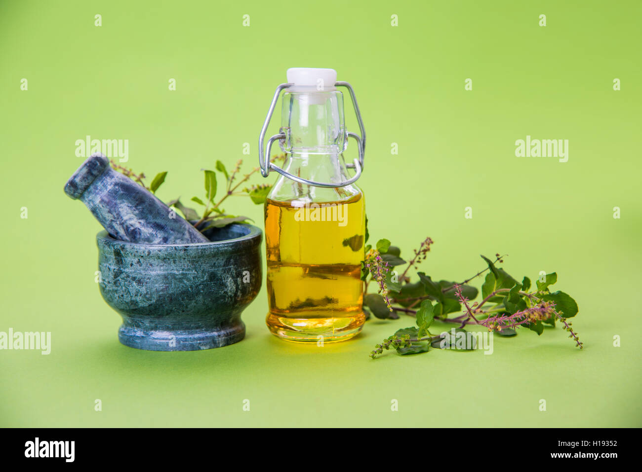 Tulsi oil or holy basil oil with Mortar and Pestle, tulsi or holy basil ...