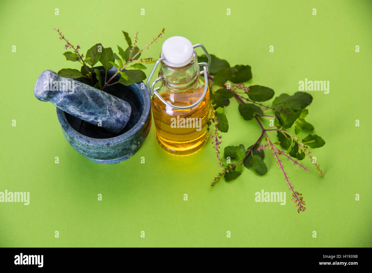 Tulsi oil or holy basil oil with Mortar and Pestle, tulsi or holy basil ...