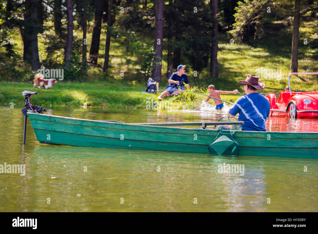 angler on the boat Stock Photo - Alamy
