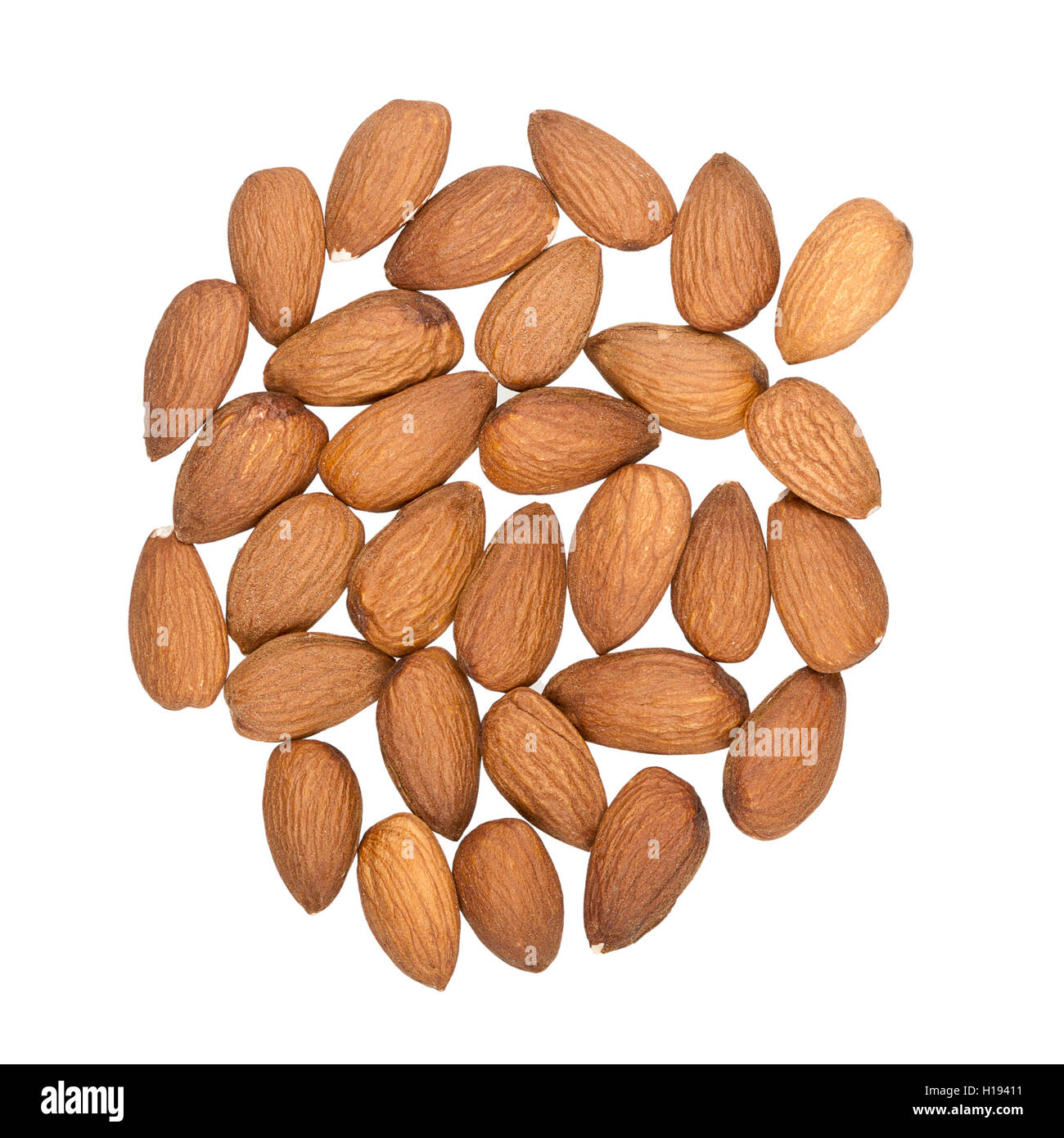 Pile of almonds isolated on white background Stock Photo - Alamy