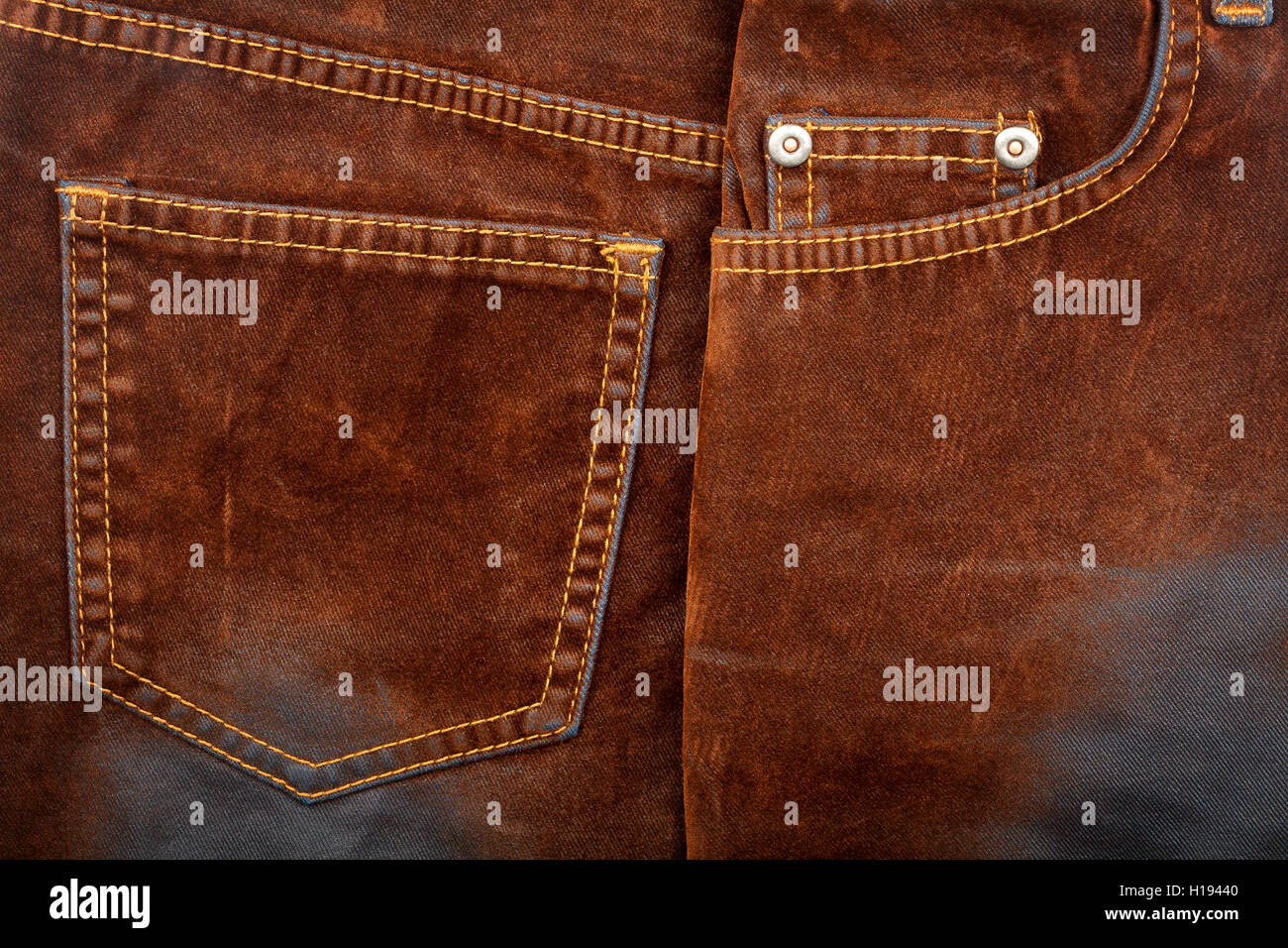 Brown jeans texture with front and back pockets Stock Photo - Alamy