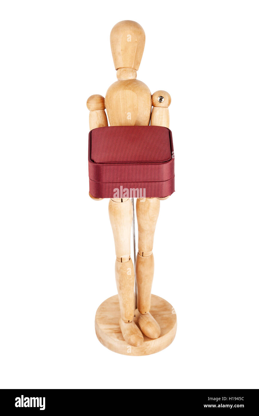Wooden dummy carrying red gift box isolated on a white background Stock ...