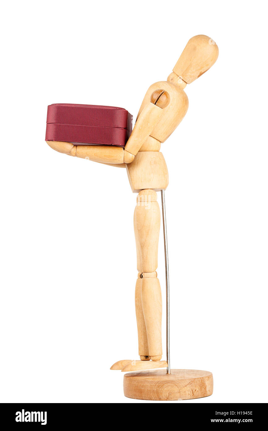 Wooden dummy carrying red gift box isolated on a white background Stock ...