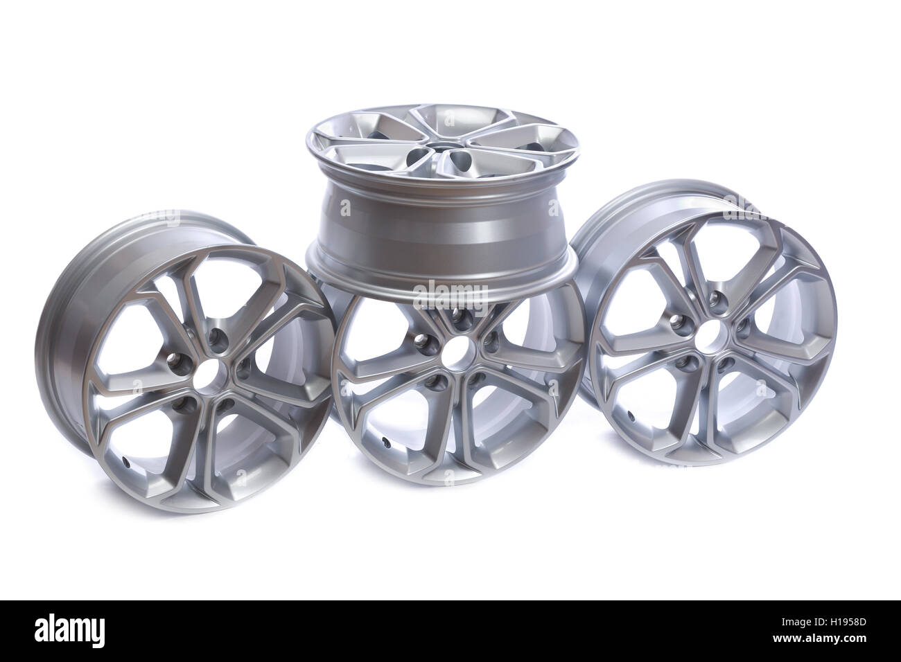 Set steel alloy car rims. Isolate on white Stock Photo - Alamy