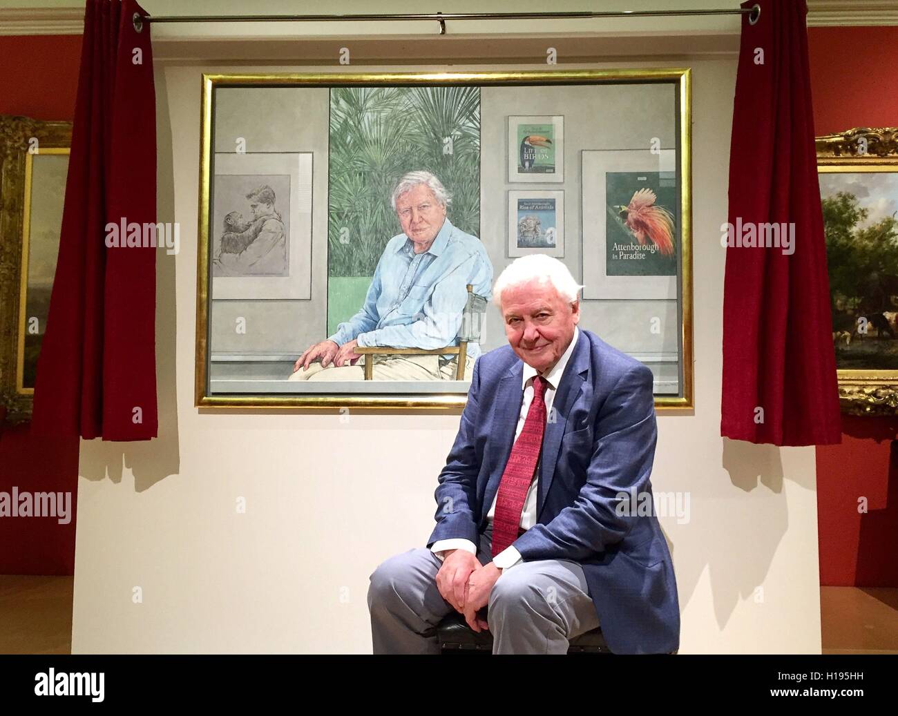 Sir David Attenborough sits in front of a portrait of himself by Bryan ...