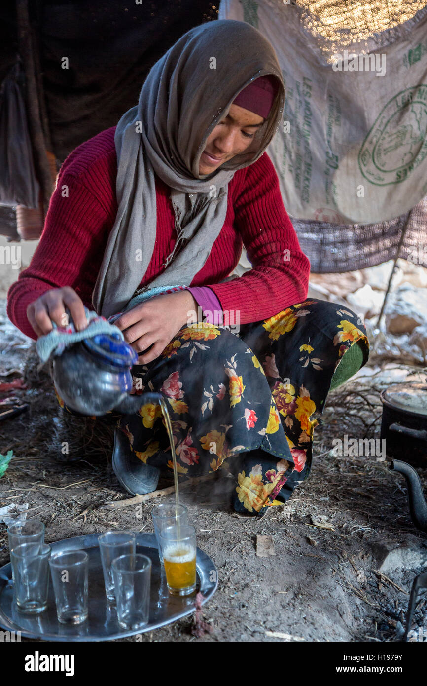 Todra Gorge, Morocco. Amazigh Berber Girl Pouring Tea for Guests inside ...