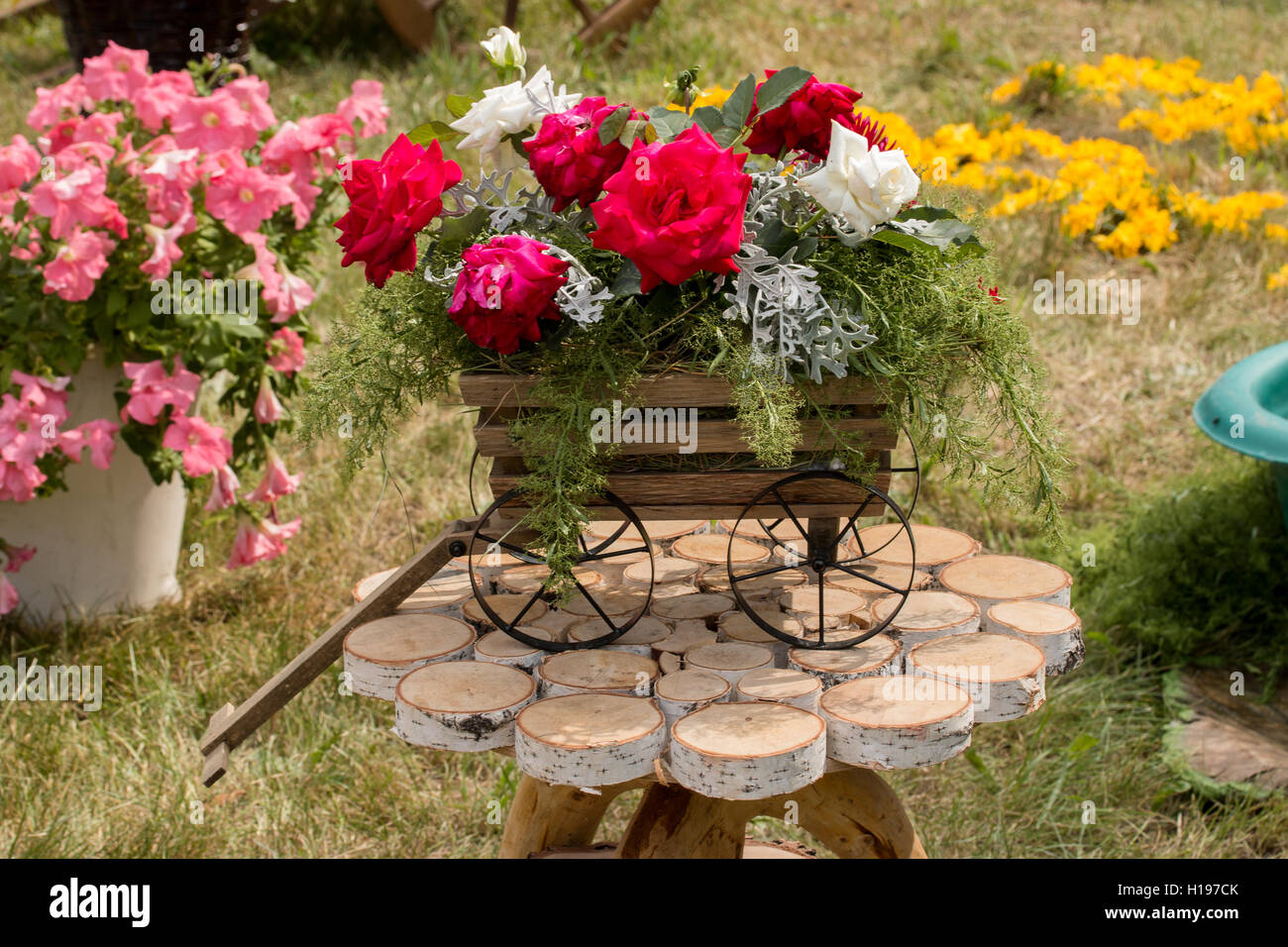 fresh flowers in a small decorative trolley Stock Photo - Alamy