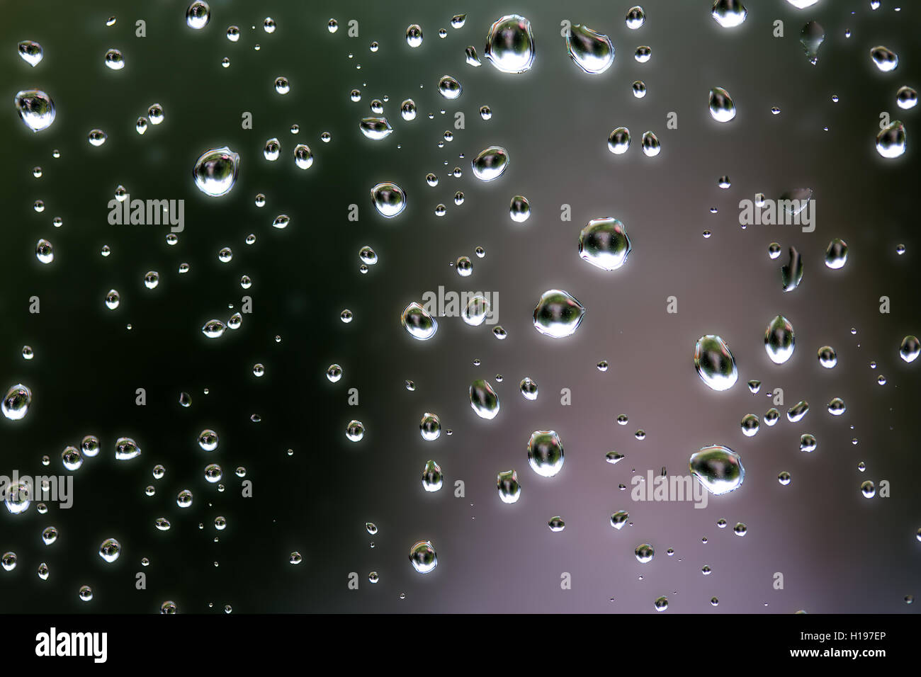 big water drop on the glass a blurred background Stock Photo - Alamy