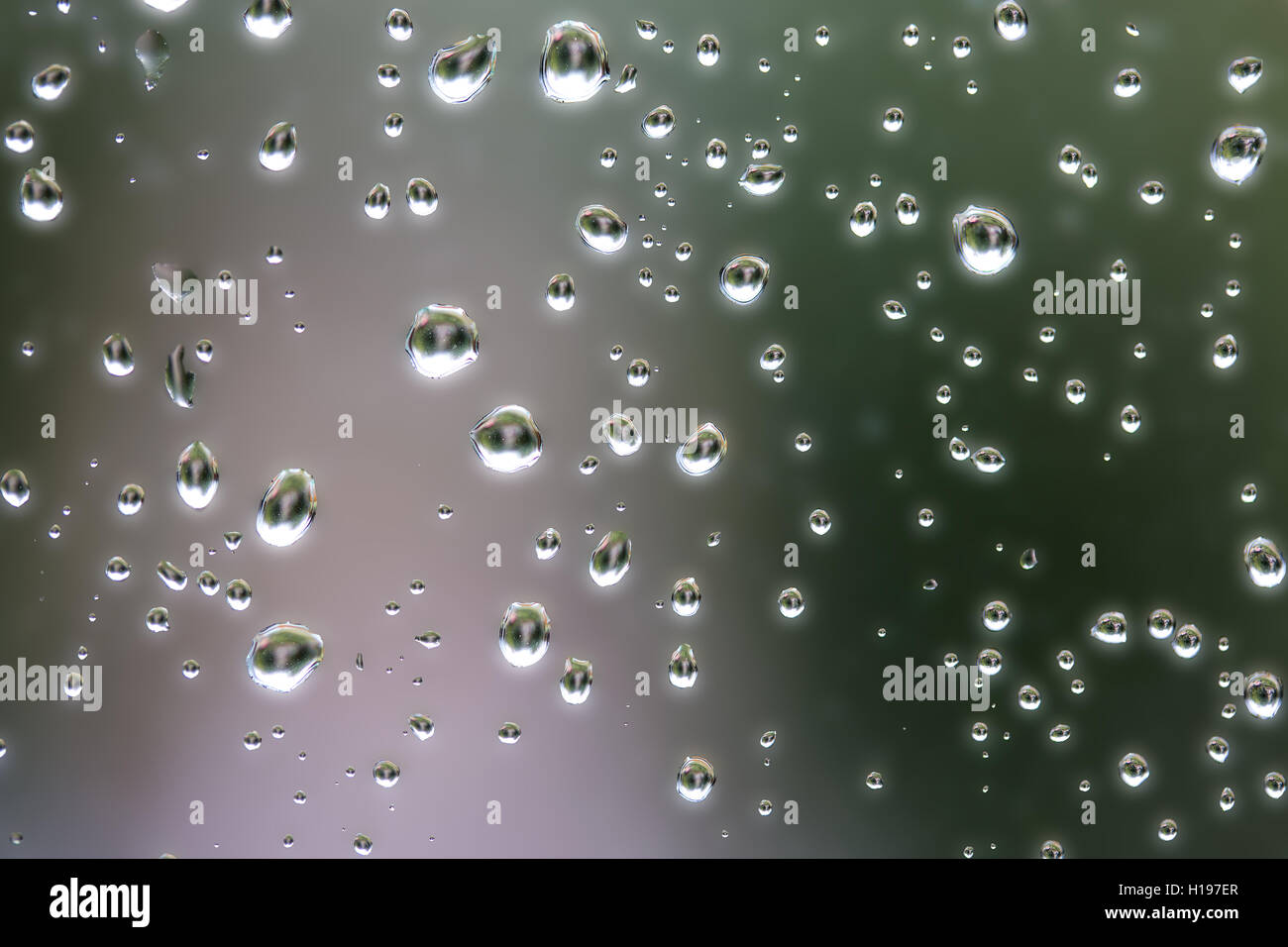 big water drop on the glass a blurred background Stock Photo - Alamy