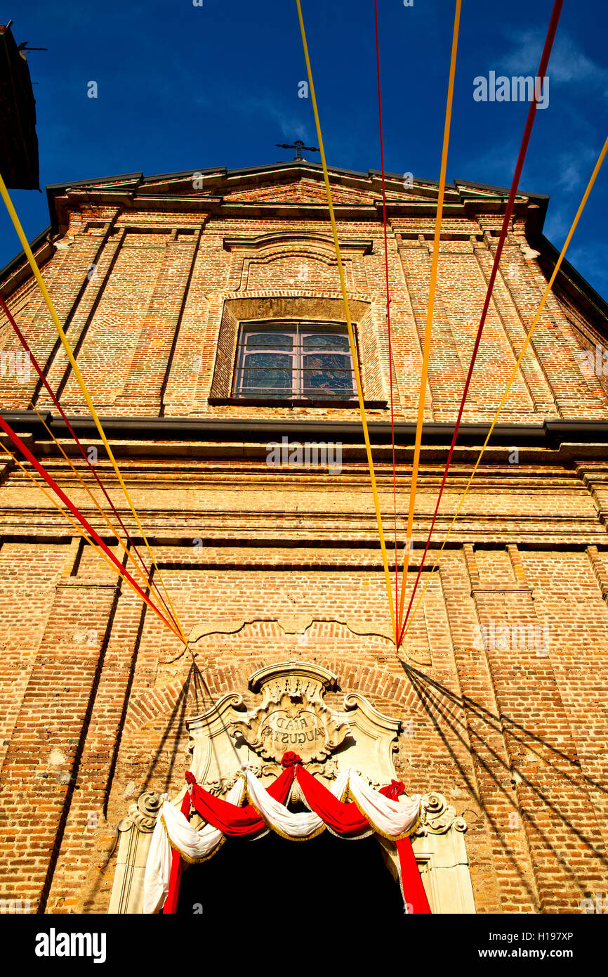 italy lombardy in the parabiago old church closed brick tower wall rose ...
