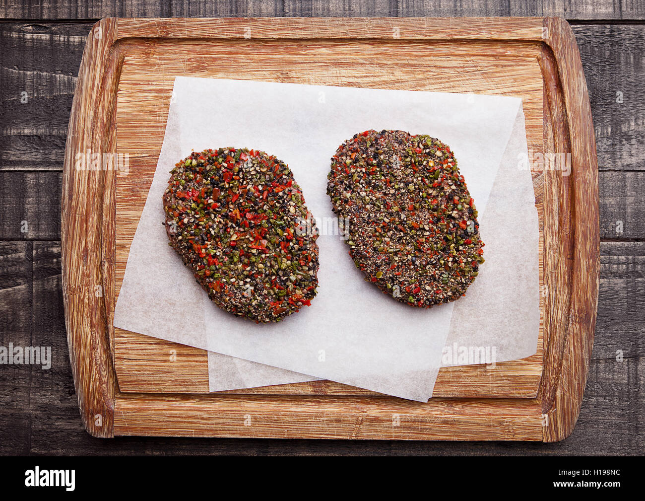 Beef raw steak on kitchen wooden board . Tree cut board Stock Photo - Alamy