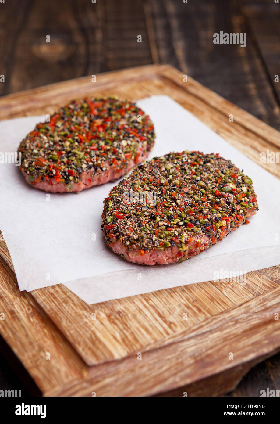 Beef raw steak on kitchen wooden board . Tree cut board Stock Photo - Alamy