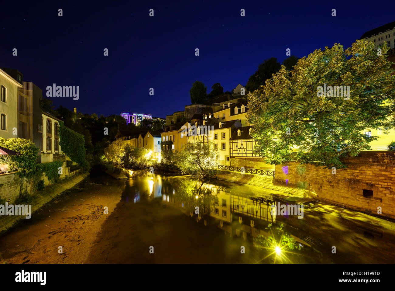 Beautiful Alzette river side scene on road Rue Munster of Luxembourg at ...