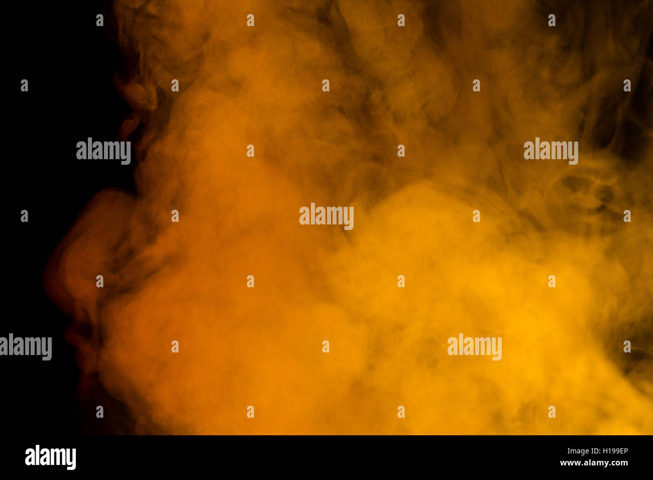 Abstract red yellow water vapor on a black background. Texture. Design ...