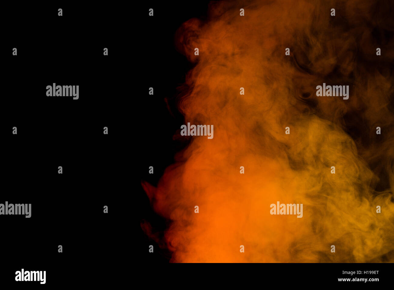 Abstract red yellow water vapor on a black background. Texture. Design ...