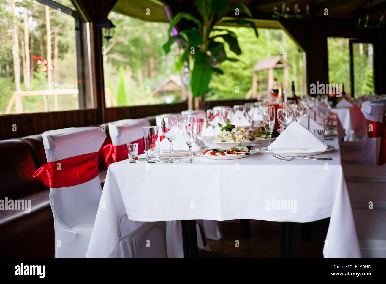 Served table in restaurant Stock Photo - Alamy