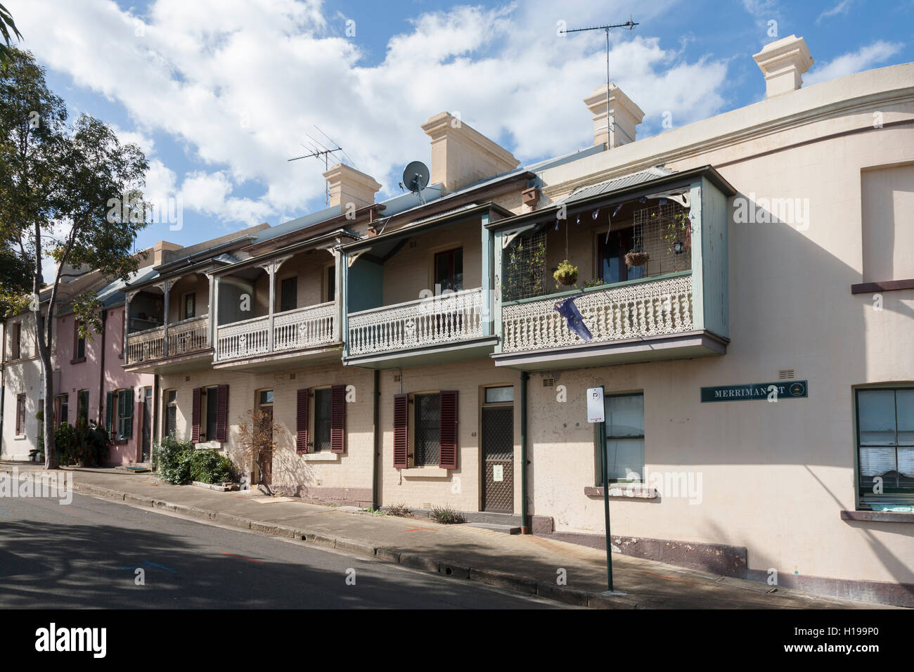 Historic streetscape of wharf workers cottages along Merriman Street ...