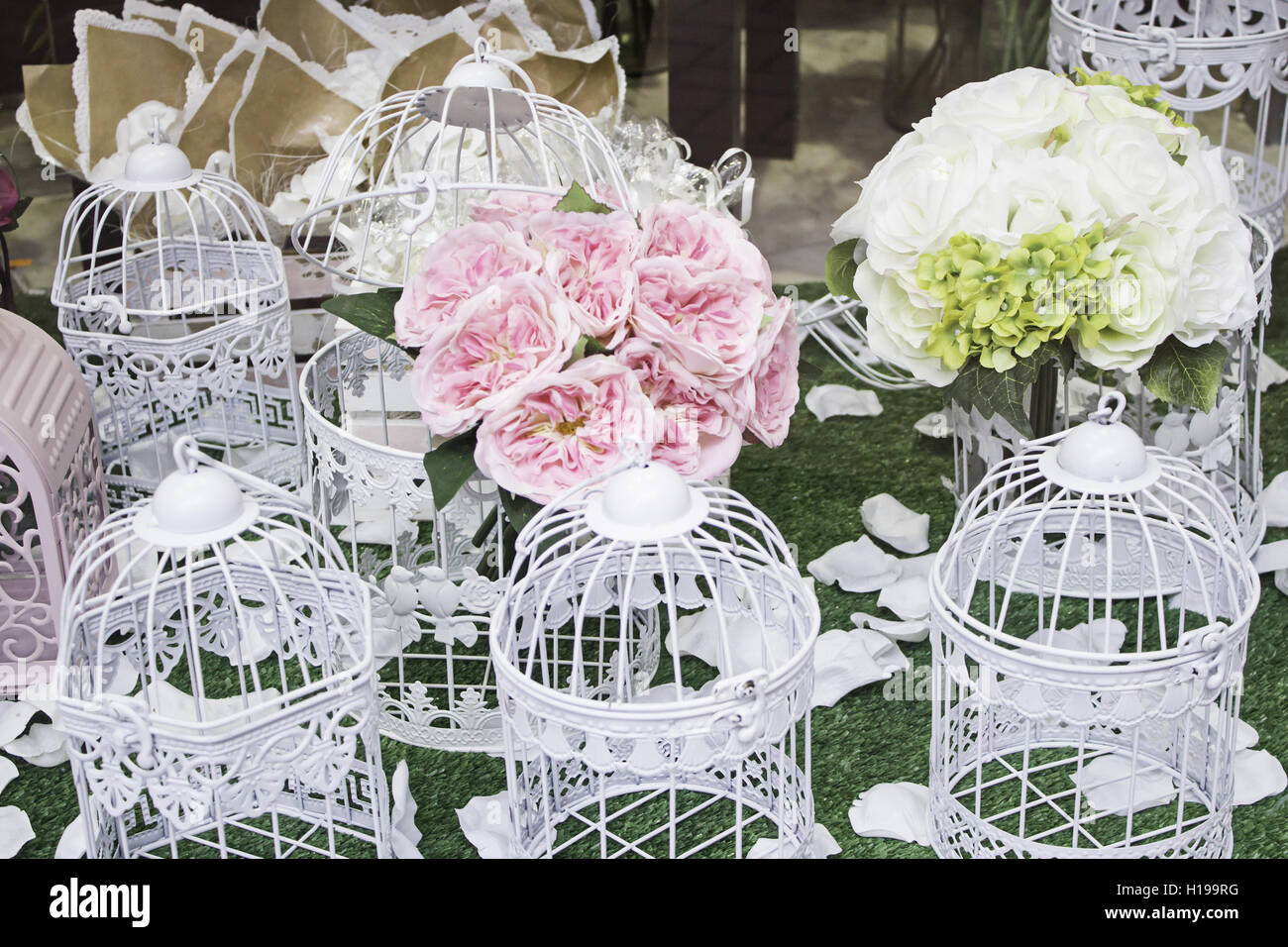 Cages Decorative wedding with flowers, celebration Stock Photo - Alamy