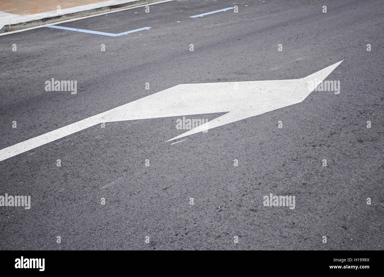 Arrow direction in urban highway sign Stock Photo - Alamy