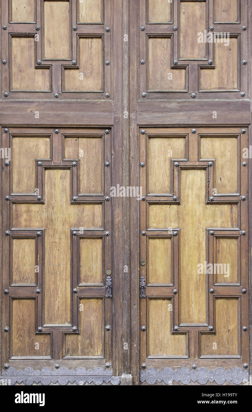 Wooden door entrance to church cross, symbol Stock Photo - Alamy