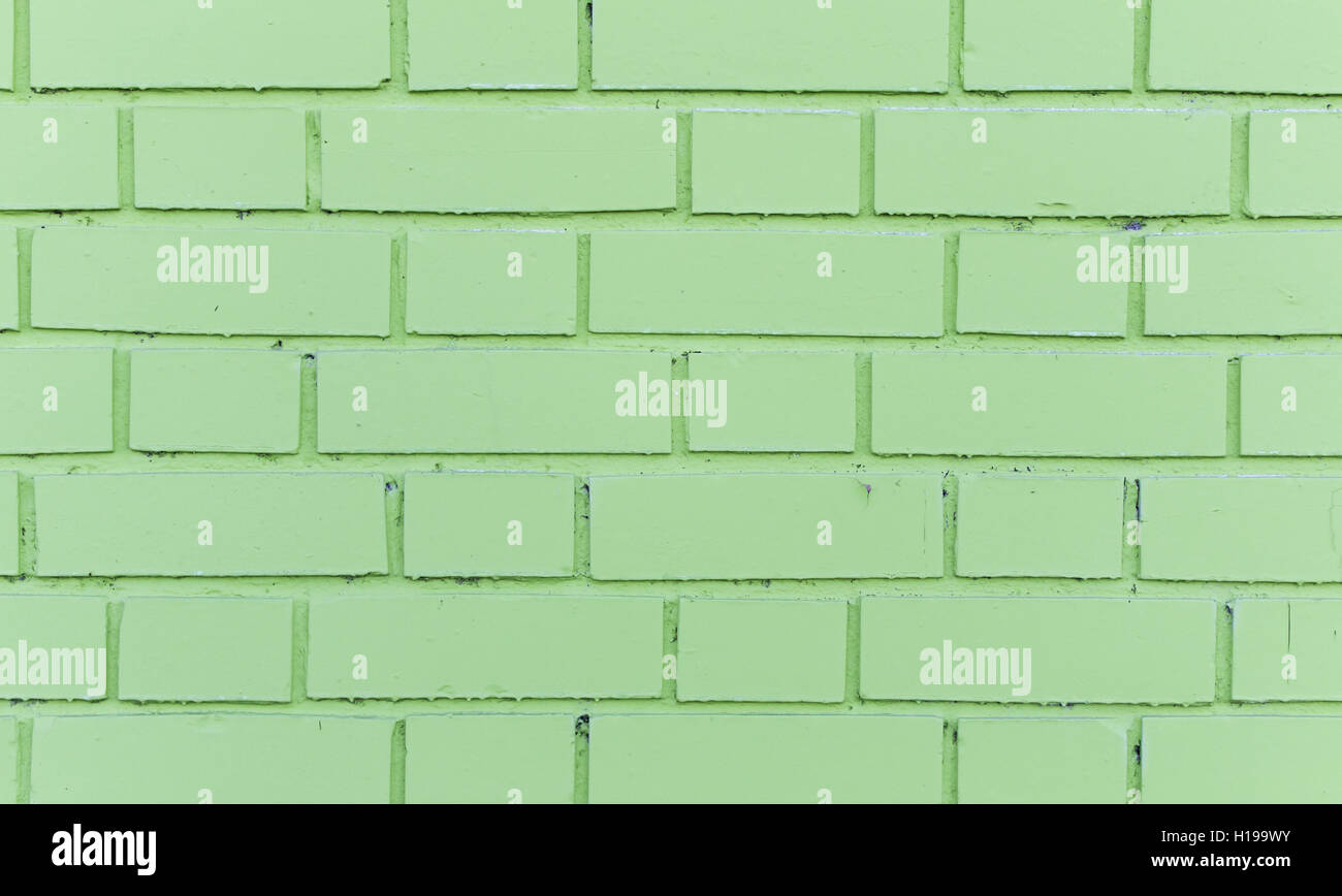 Green brick wall urban building, construction Stock Photo - Alamy