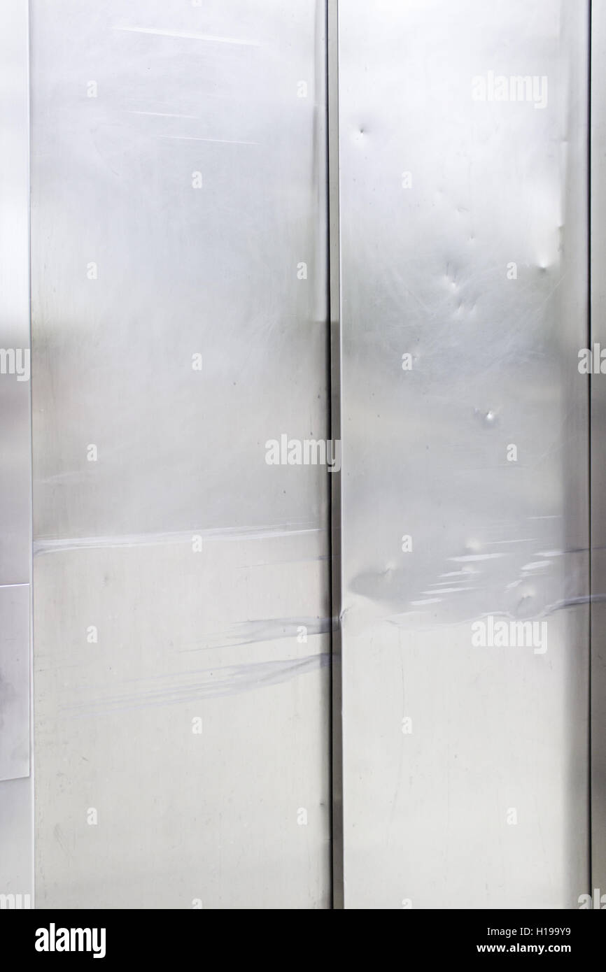 Elevator silver inside office building Stock Photo - Alamy
